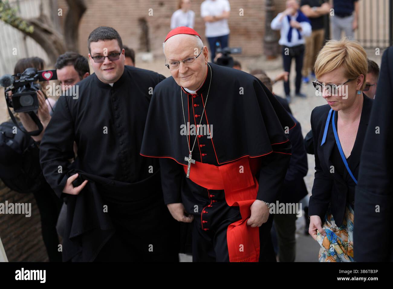 Cardinal Peter Erdo arrives to lead a mass at his titular church of ...