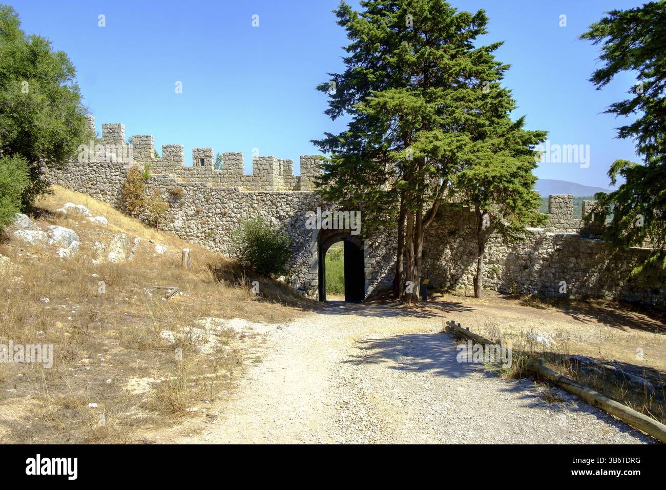 View of medieval wall and gate at the Moorish Castle above Sesimbra ...