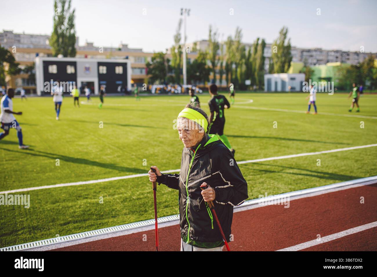 Older woman trains in hi-res stock photography and images - Alamy