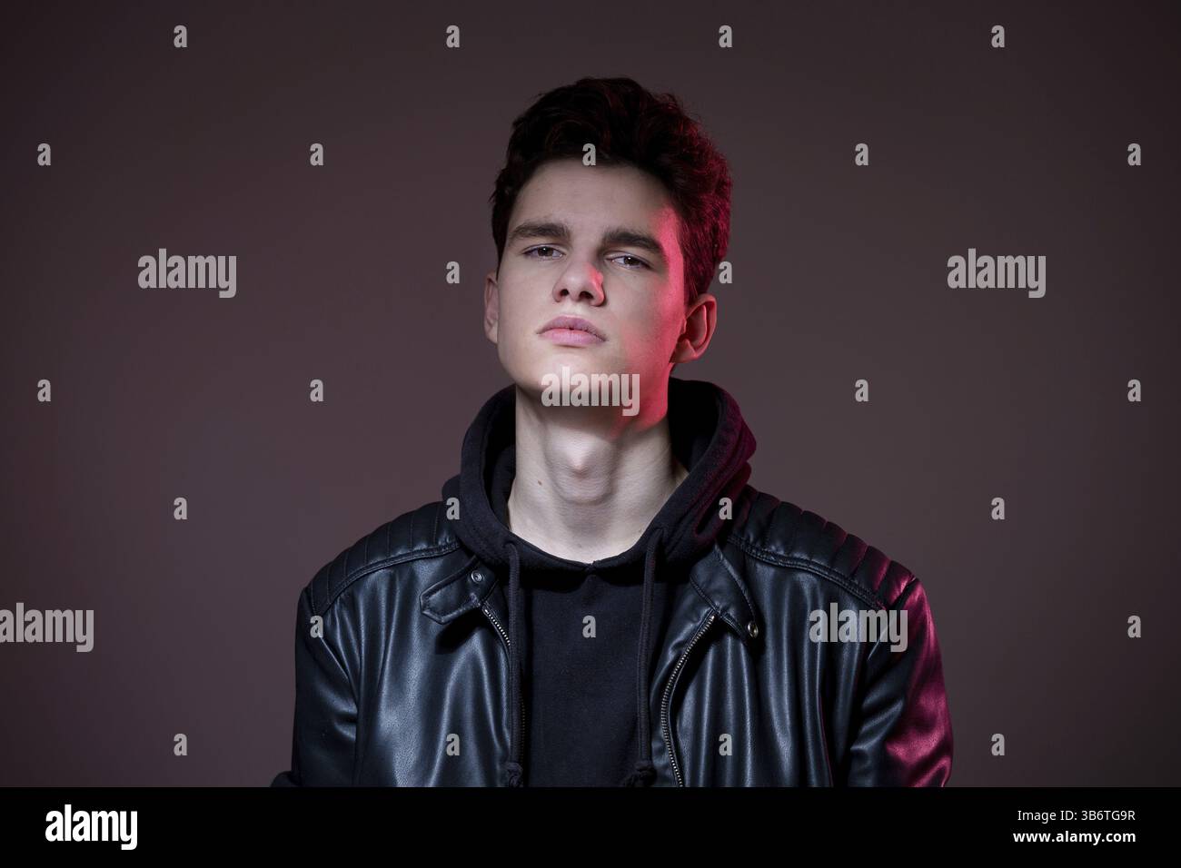 Attractive young guy posing in studio. Young caucasian guy model in ...