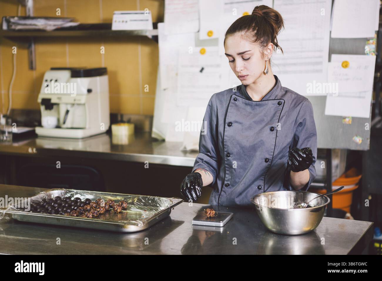 Subject profession and cooking pastry. young Caucasian woman with ...