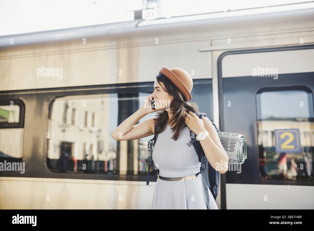 Theme transportation and travel. portrait young caucasian woman with ...