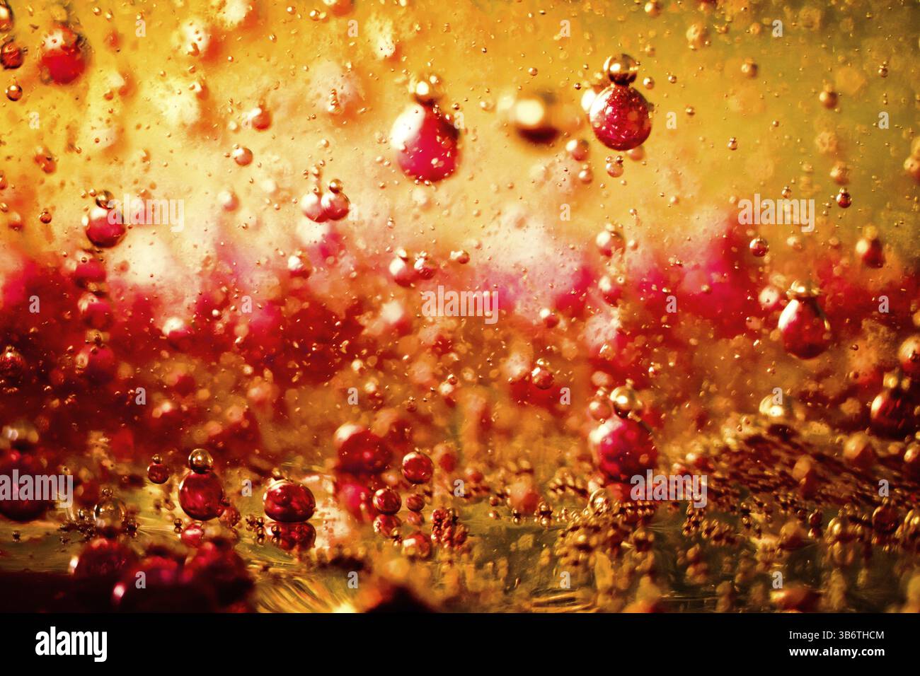 Colorful bubbly liquid in with unique shapes and pattern. Artistic ...