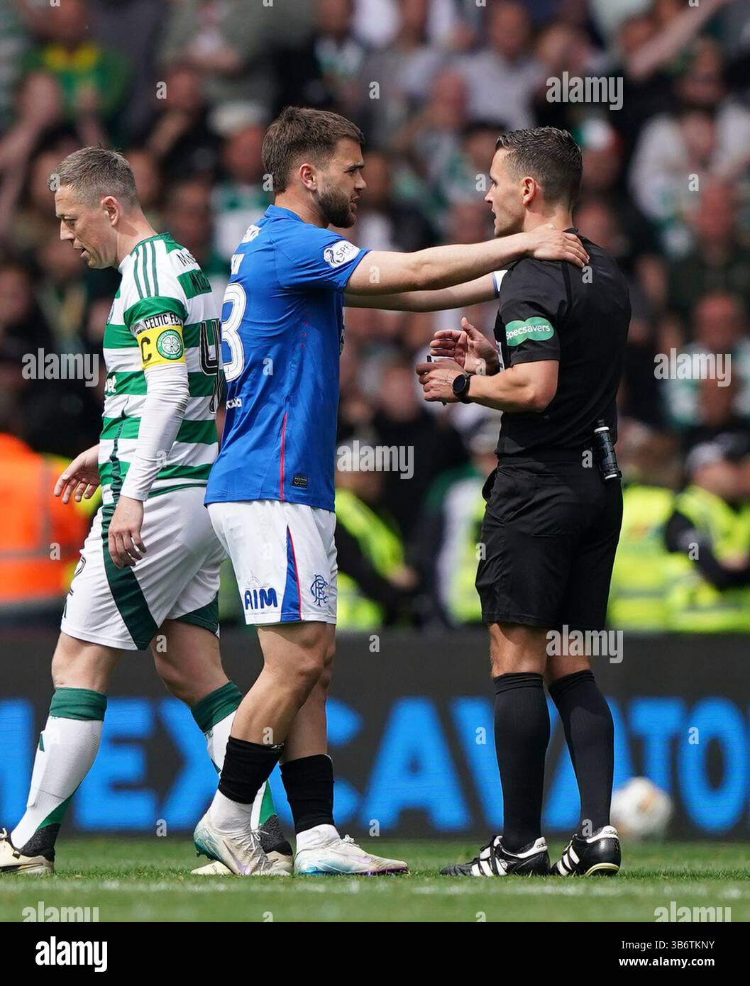 Rangers' Nicolas Raskin speaks to refree Nick Walsh during the William ...