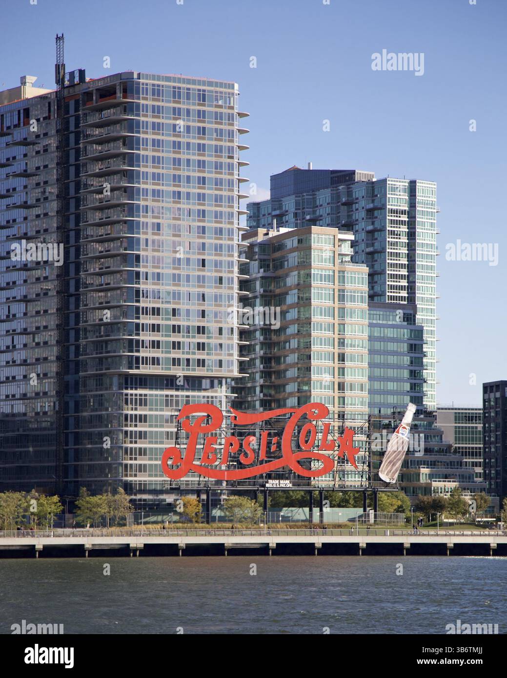 Historic landmark Pepsi Cola sign before recently-constructed luxury ...