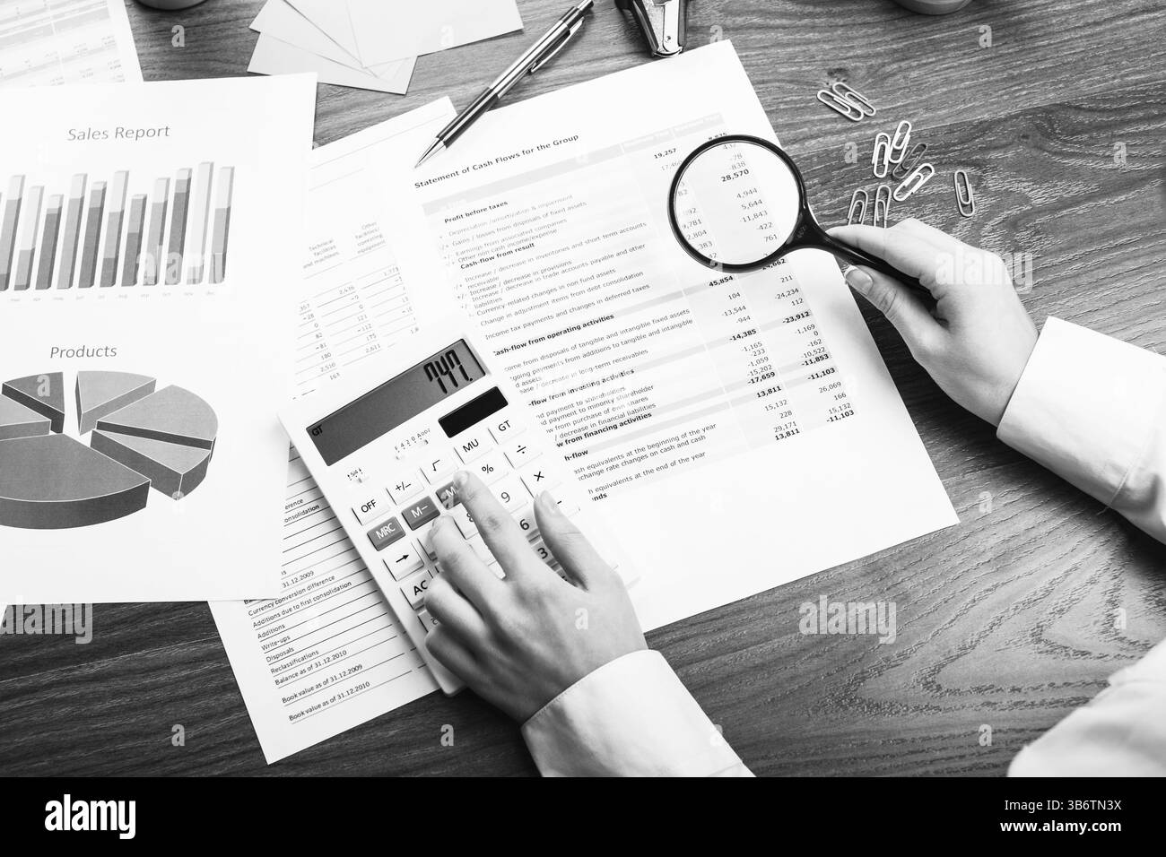 Close up of a female hand calculating, on the office desk Stock Photo ...
