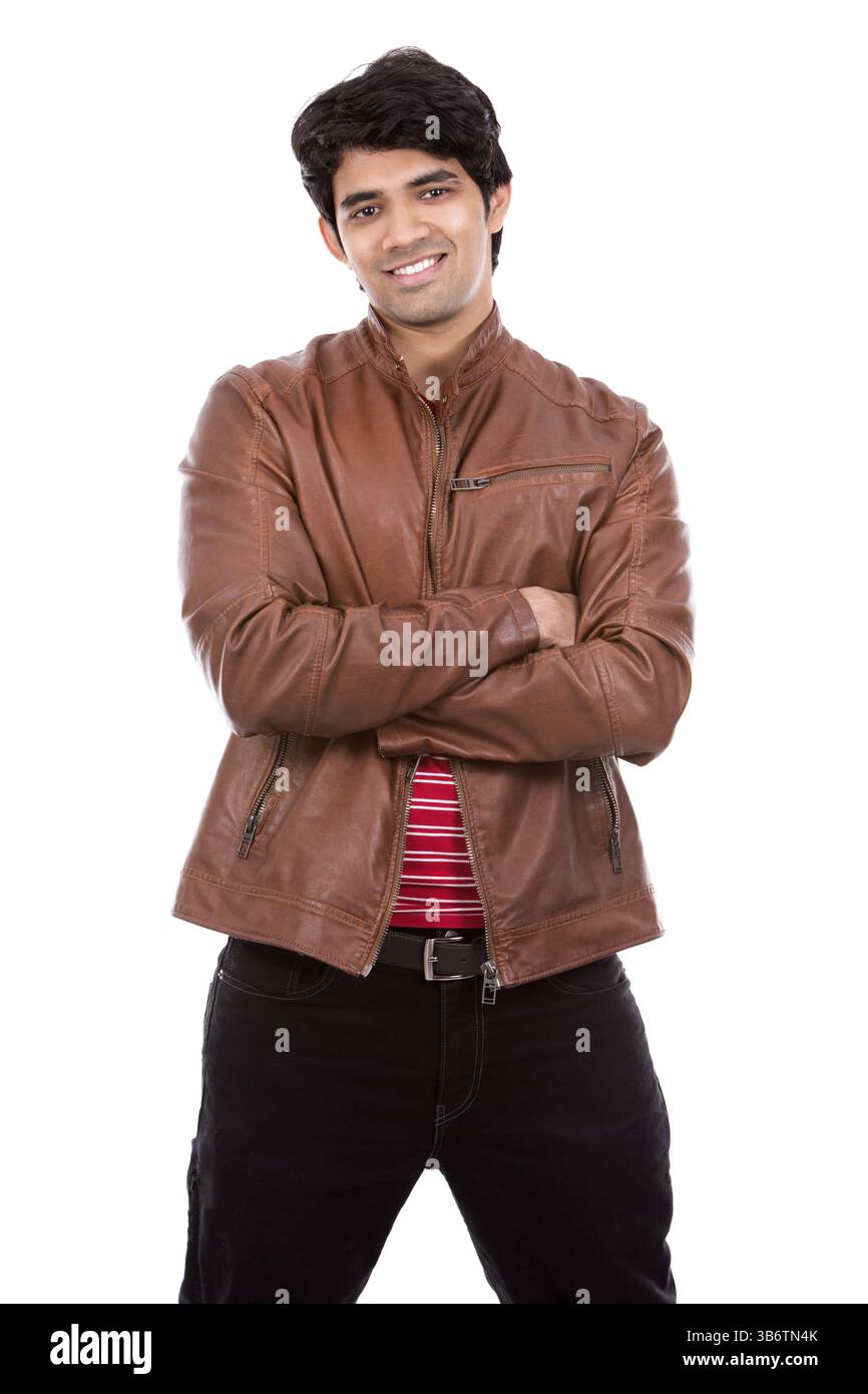 Handsome east indian man wearing red shirt on white isolated background ...