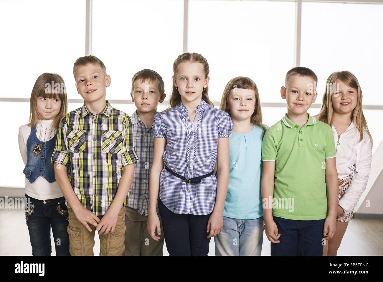 Kid group together hi-res stock photography and images - Alamy