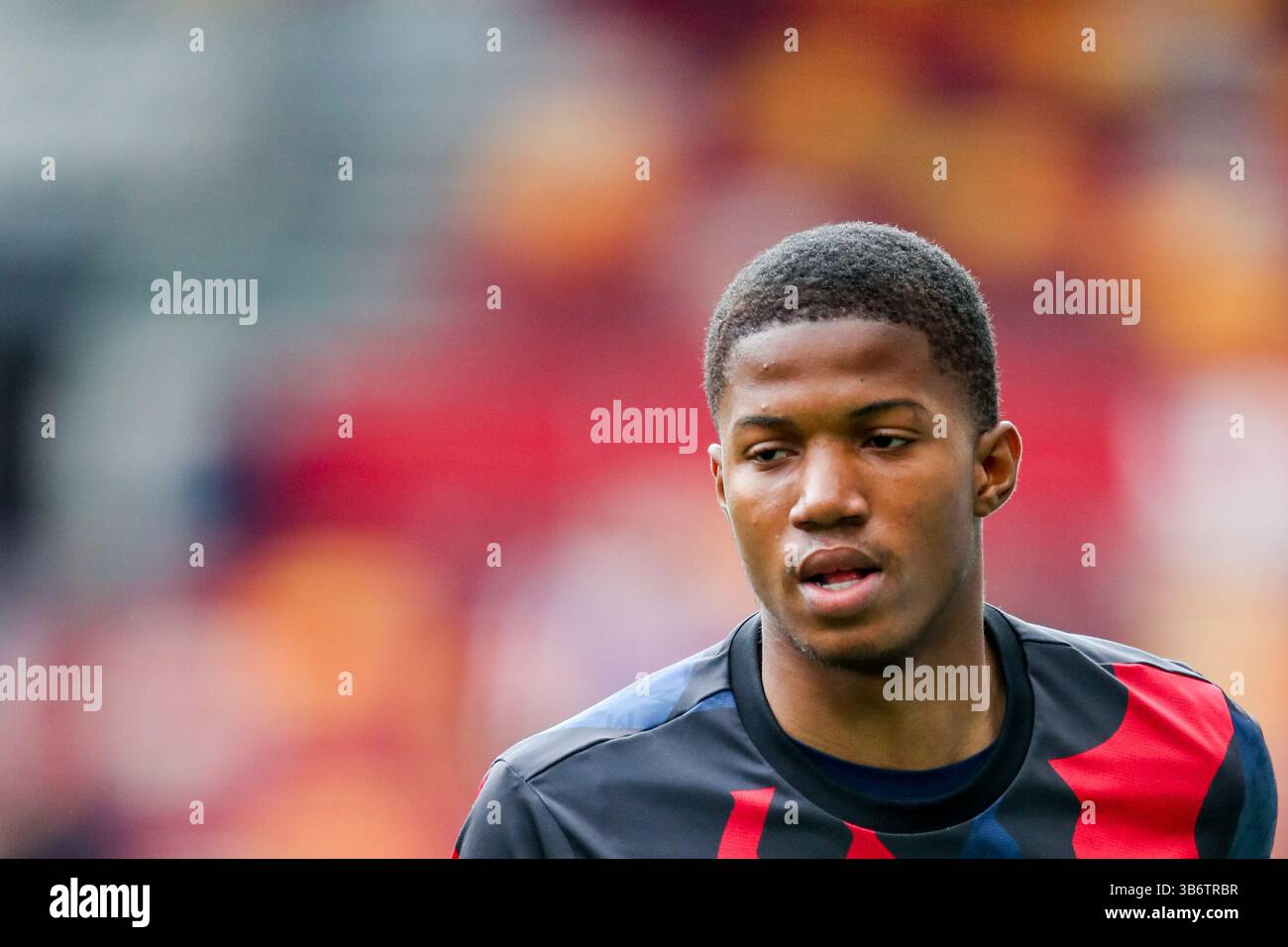London, UK. 04th May, 2025. Chido Obi-Martin of Manchester United warms ...