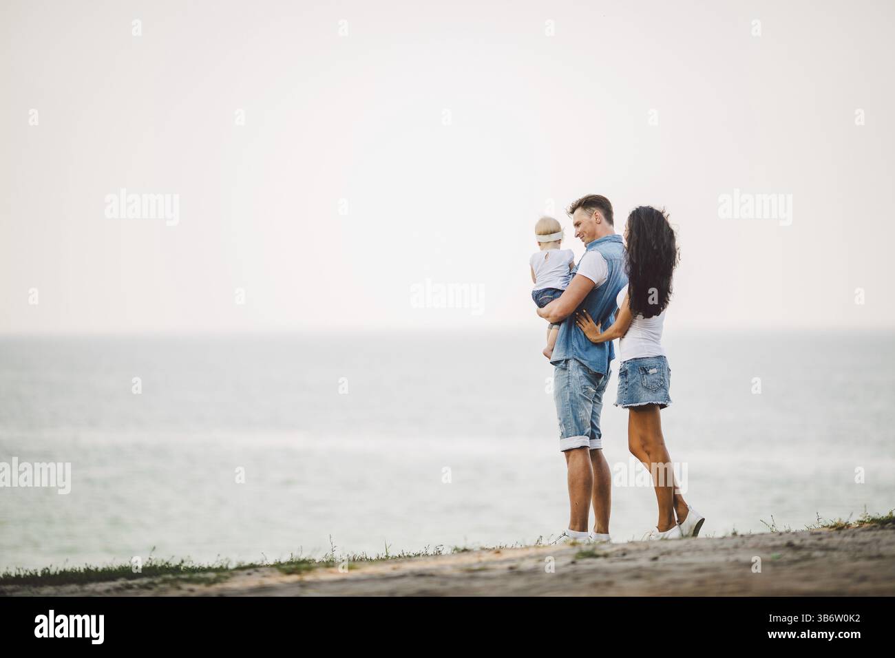 Dad standing over daughter hi-res stock photography and images - Alamy