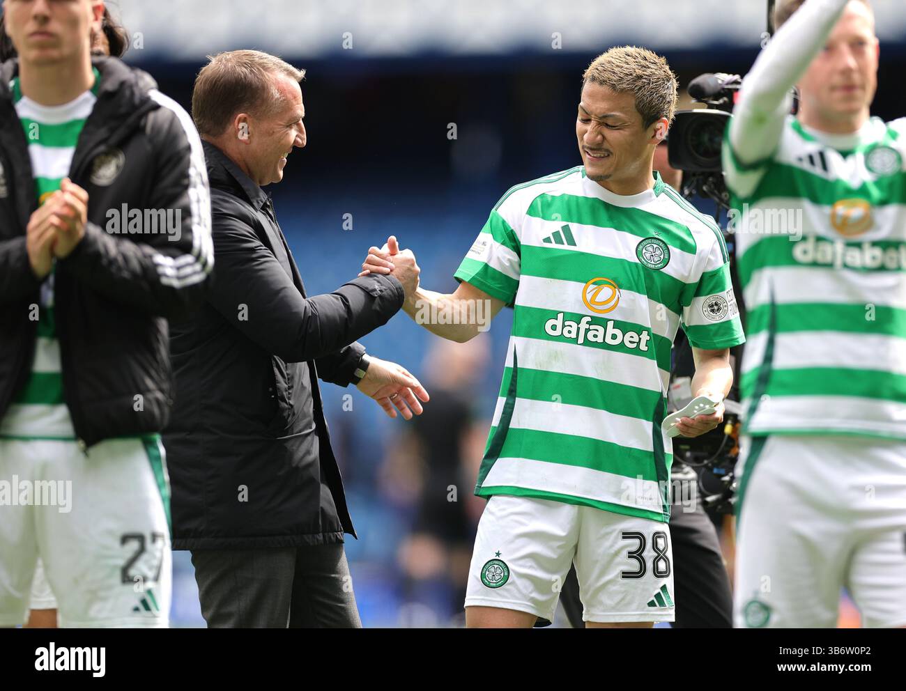 Celtic manager Brendan Rodgers shake hands with player Daizen Maeda ...