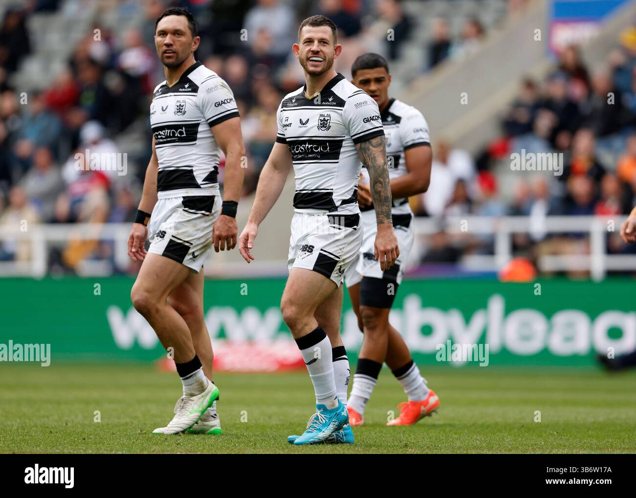 Hull FC's Jordan Rapana (left) and Cade Cust during the Betfred Super ...
