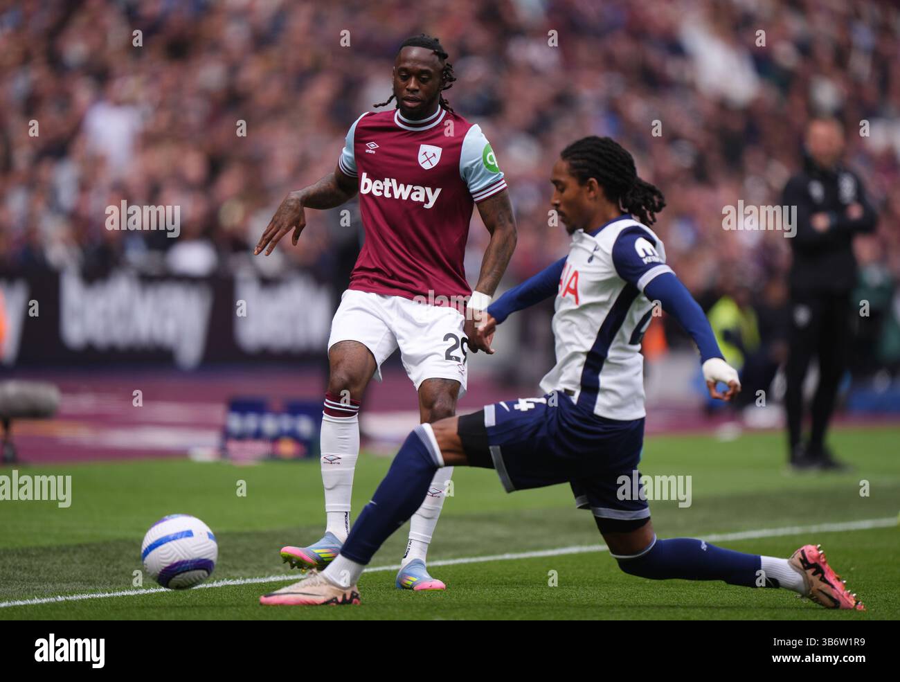 West Ham United's Aaron Wan-Bissaka (left) and Tottenham Hotspur's Djed ...