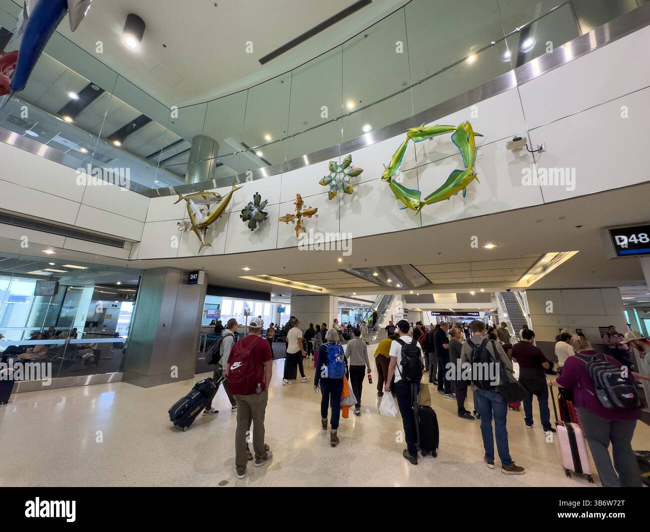 April 12, 2024, Miami, Florida, United States: Travelers in the Miami ...