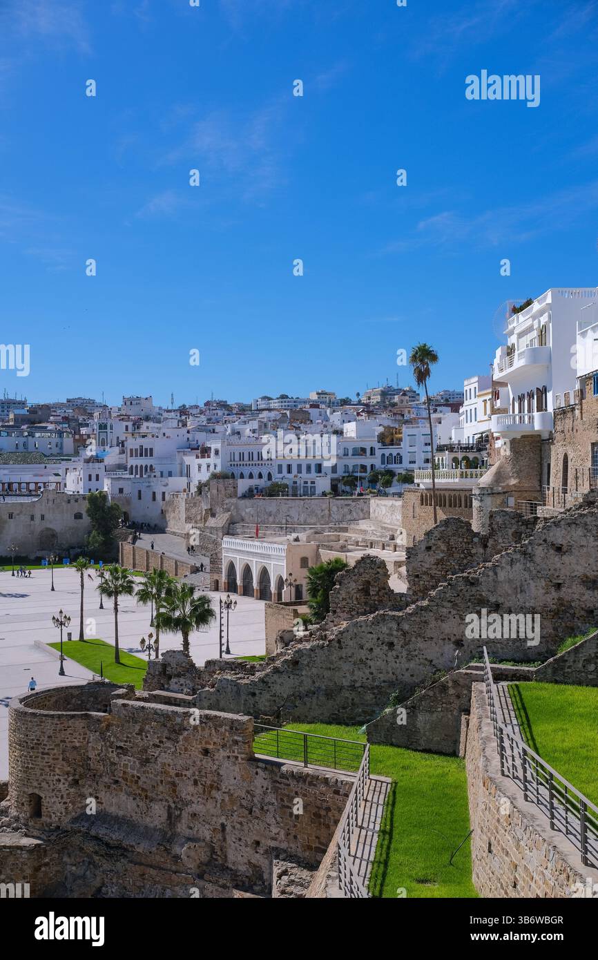 The ancient city walls of Tangier frame a modern port and new urban ...