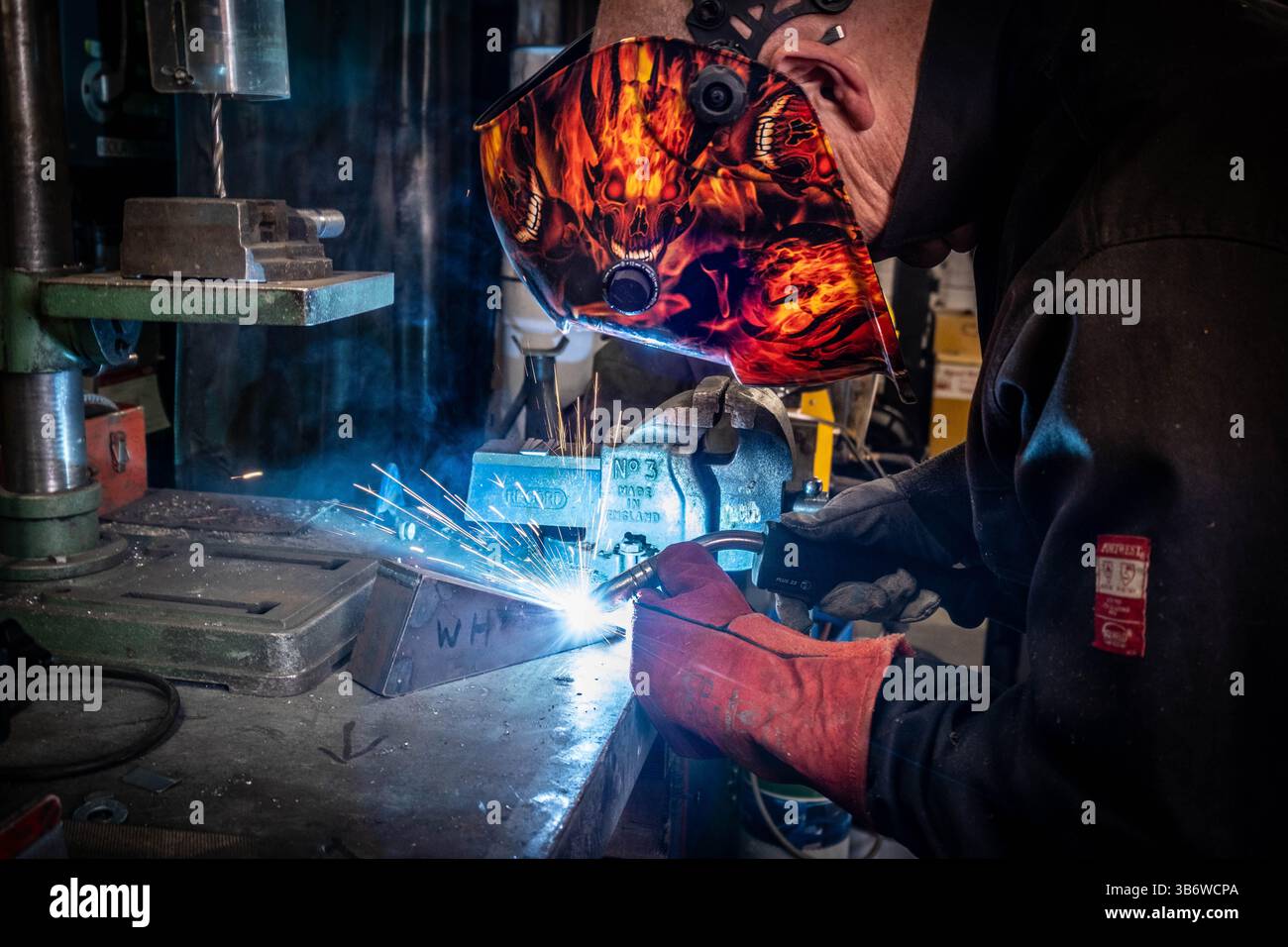 engineer welding in a workshop Stock Photo - Alamy