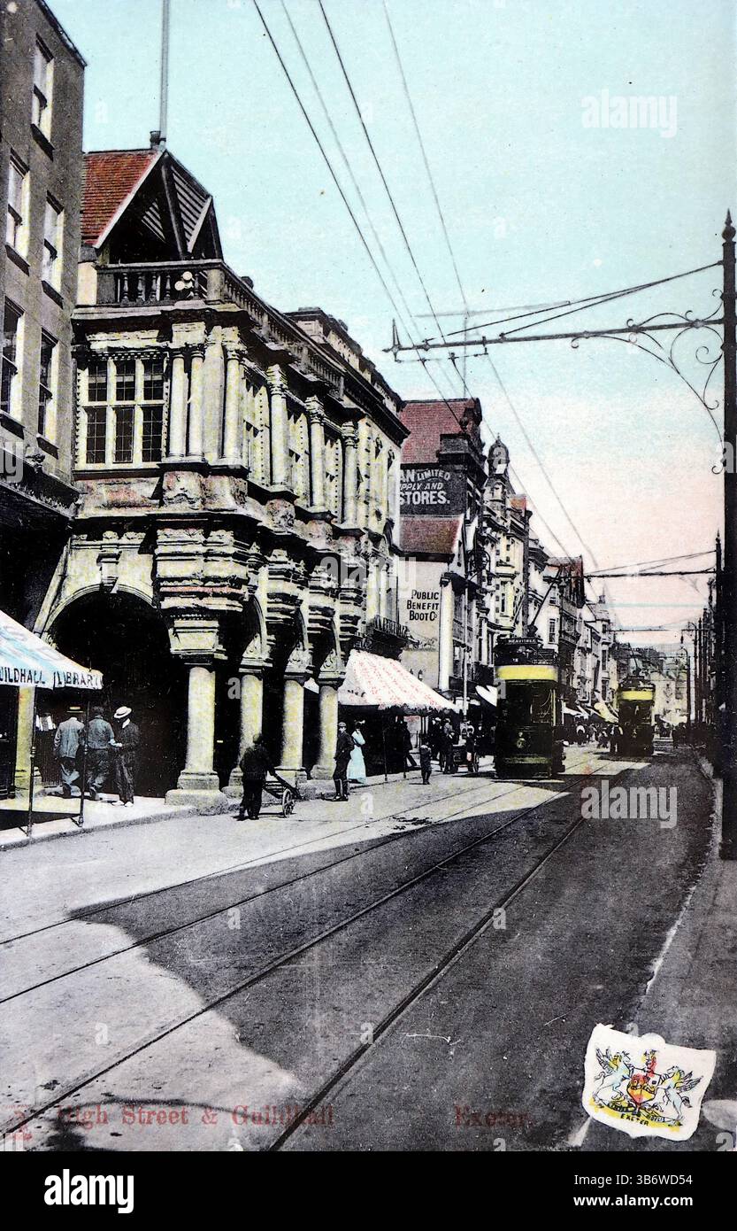 High Street and Guildhall, Exeter, including shops and trams. Published ...