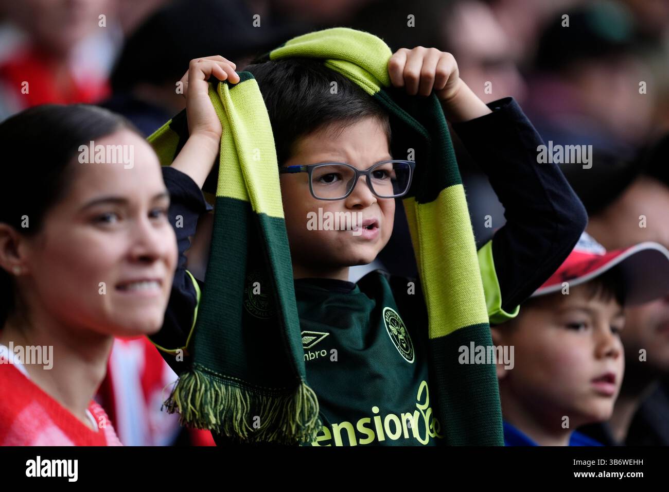 A young Brentford fan in the stands during the Premier League match at ...