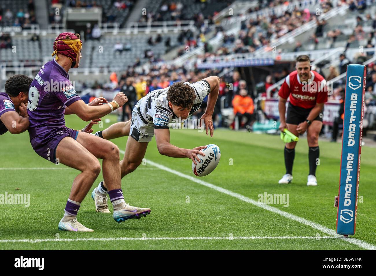 Lewis Martin of Hull FC goes over for a try during the Betfred Magic ...