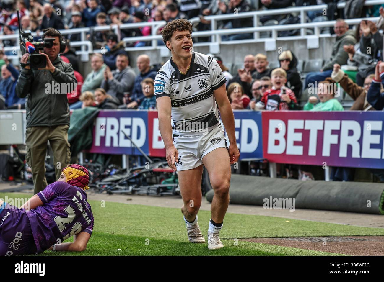 Lewis Martin of Hull FC celebrates his try during the Betfred Magic ...