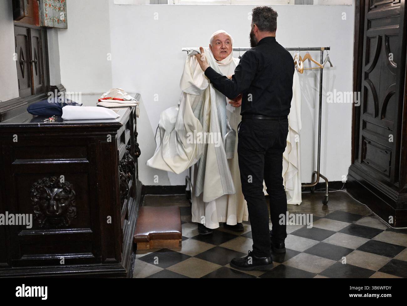 French Cardinal ‘papabile’ Jean-Marc Aveline prepares in the sacristy ...