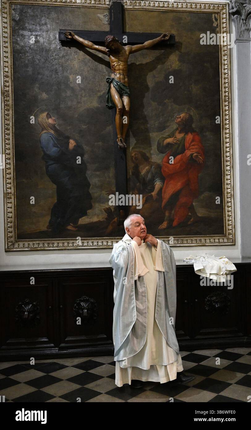 French Cardinal ‘papabile’ Jean-Marc Aveline prepares in the sacristy before celebrating a mass ...