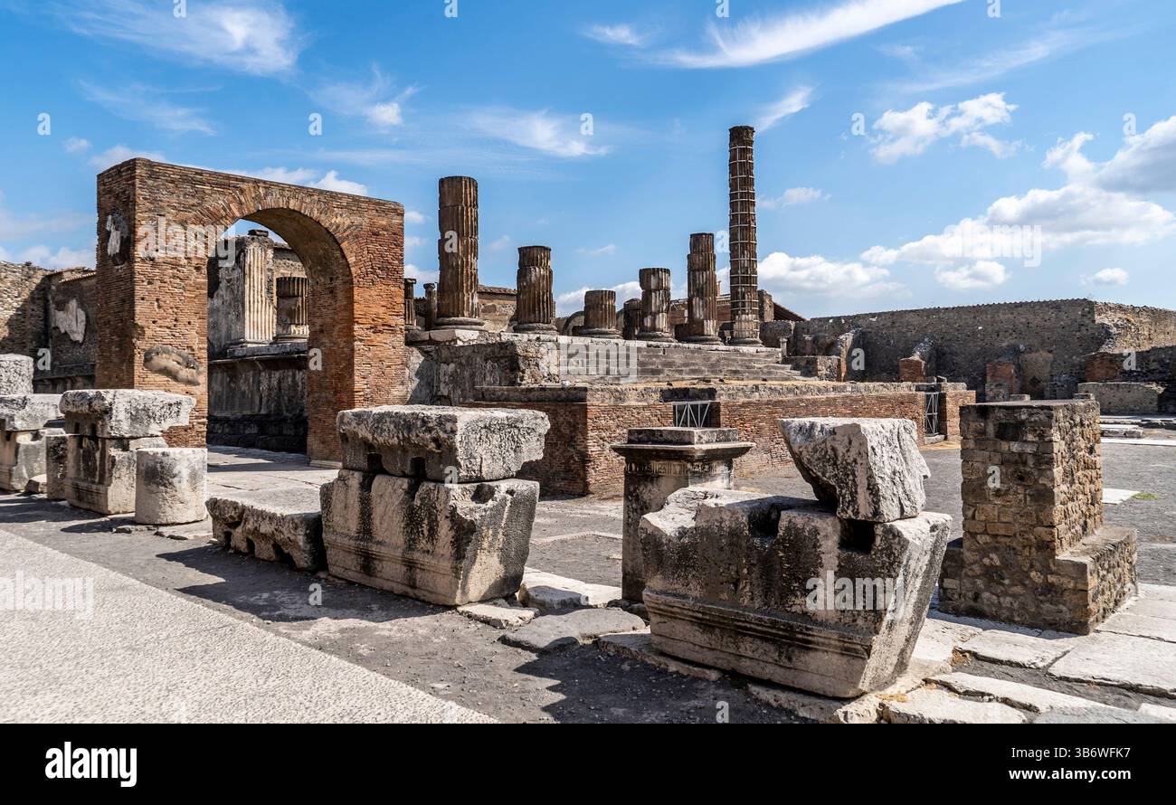 Ancient ruins of Pompeii, showcasing stone structures, columns, and an ...
