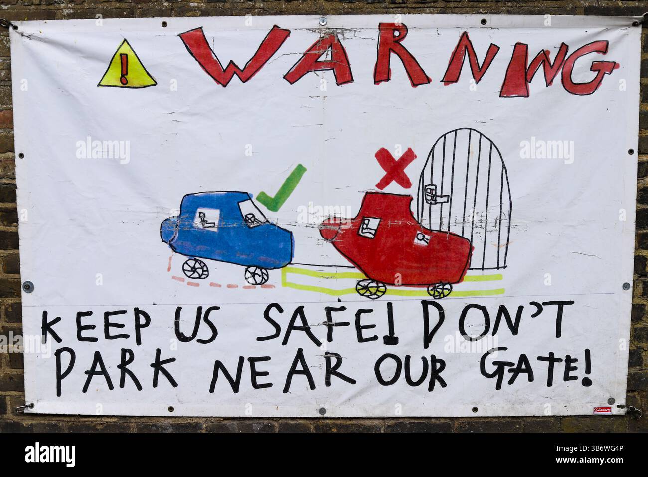 Large banner displayed on a Victorian school wall warning drivers to ...