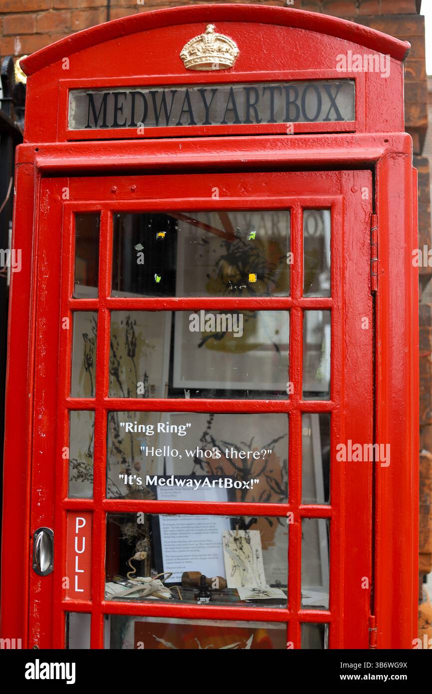 Traditional British Red Telephone Box repurposed as a Medway public art ...