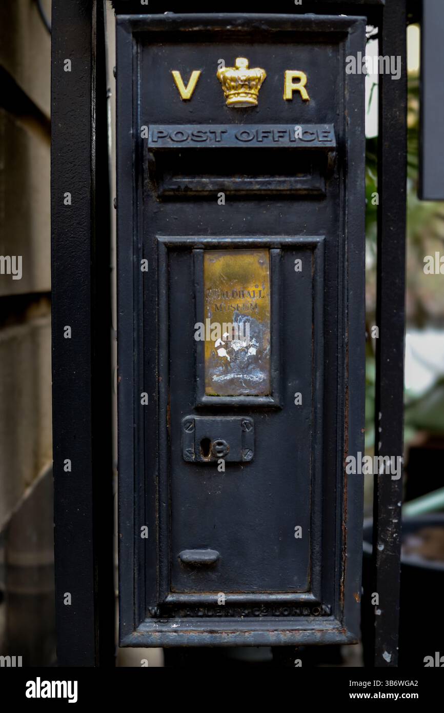 A Victorian Era post box mounted into railings at the Cafe Nucleus arts ...