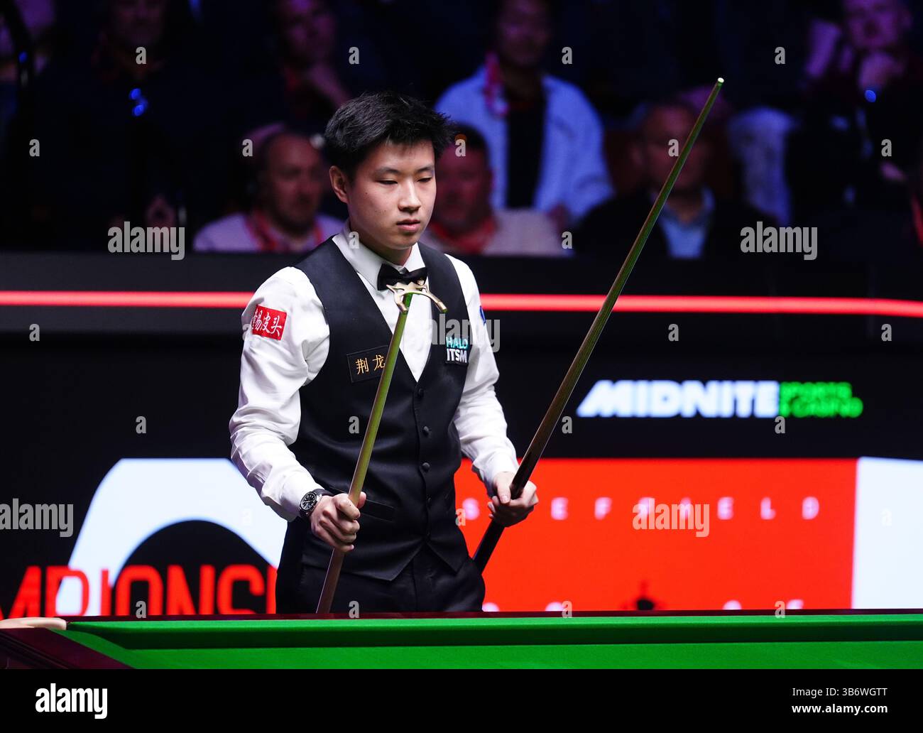 Zhao Xintong during his match with Mark Williams on day sixteen of the ...