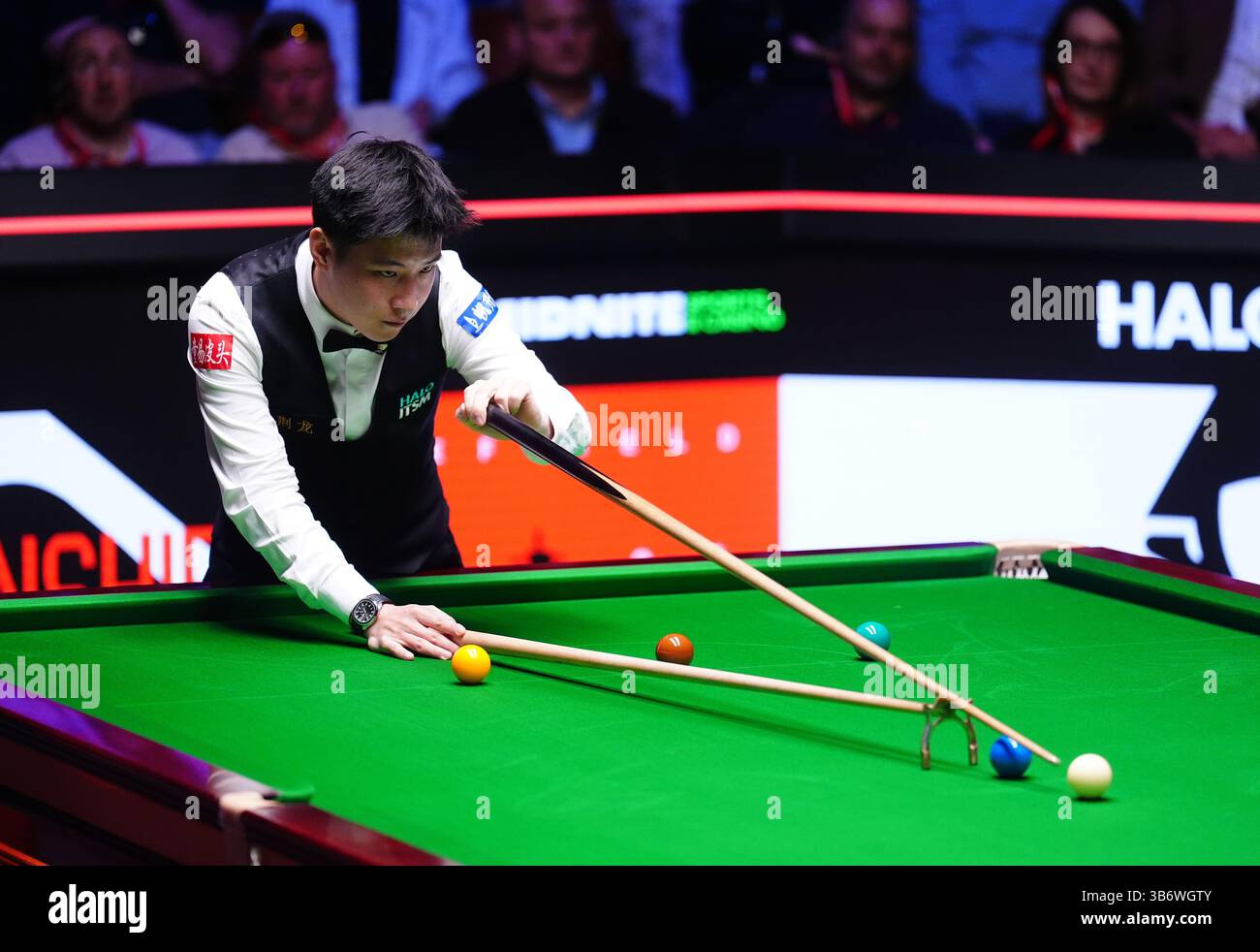 Zhao Xintong during his match with Mark Williams on day sixteen of the ...