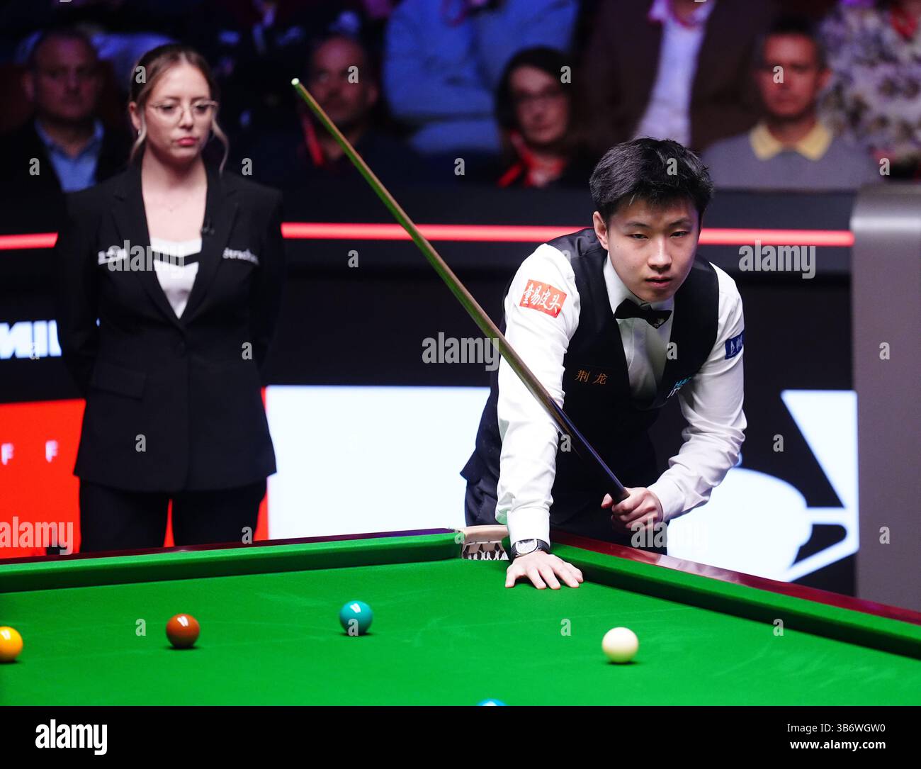 Zhao Xintong during his match with Mark Williams on day sixteen of the ...