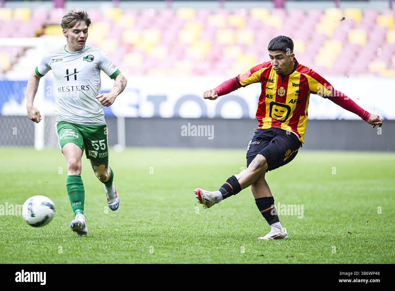 Mechelen, Belgium. 04th May, 2025. KVV Zelzate's Wolf Ackx and Jong KV Mechelen's Moncef Zekri ...