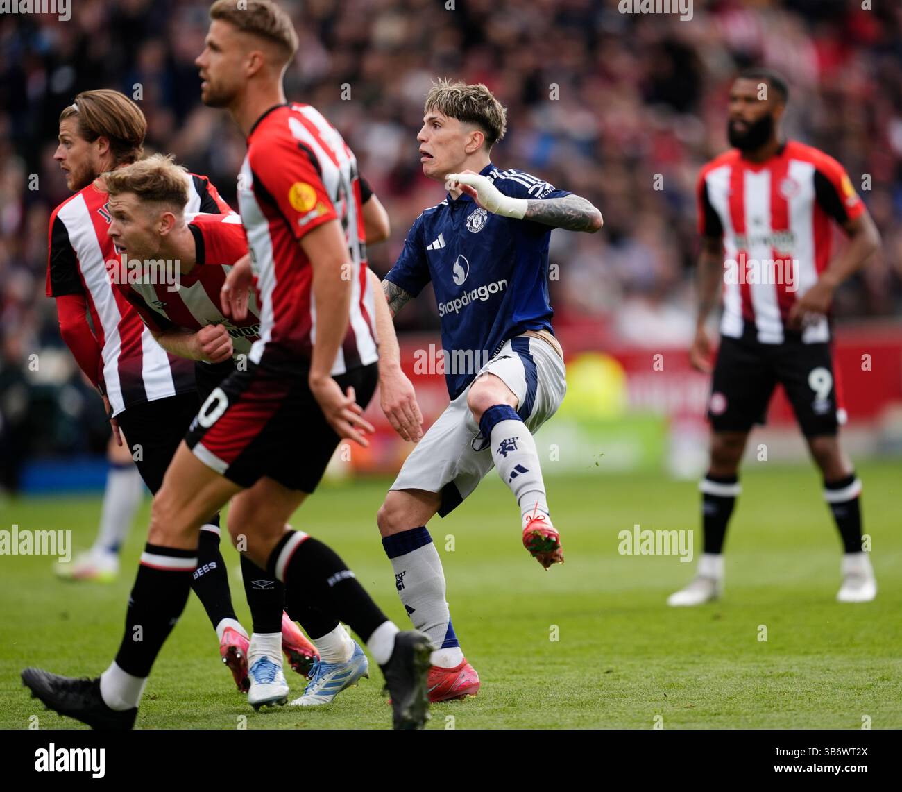 Manchester United's Alejandro Garnacho scores their side's third goal ...