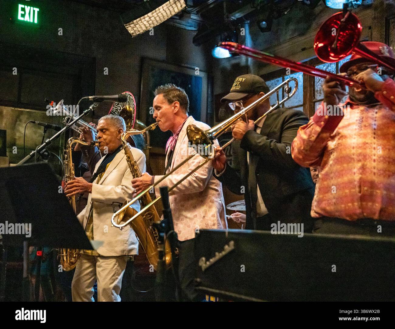 Charlie Gabriel, left, Clint Maedgen and Ronnel Johnson perform with ...