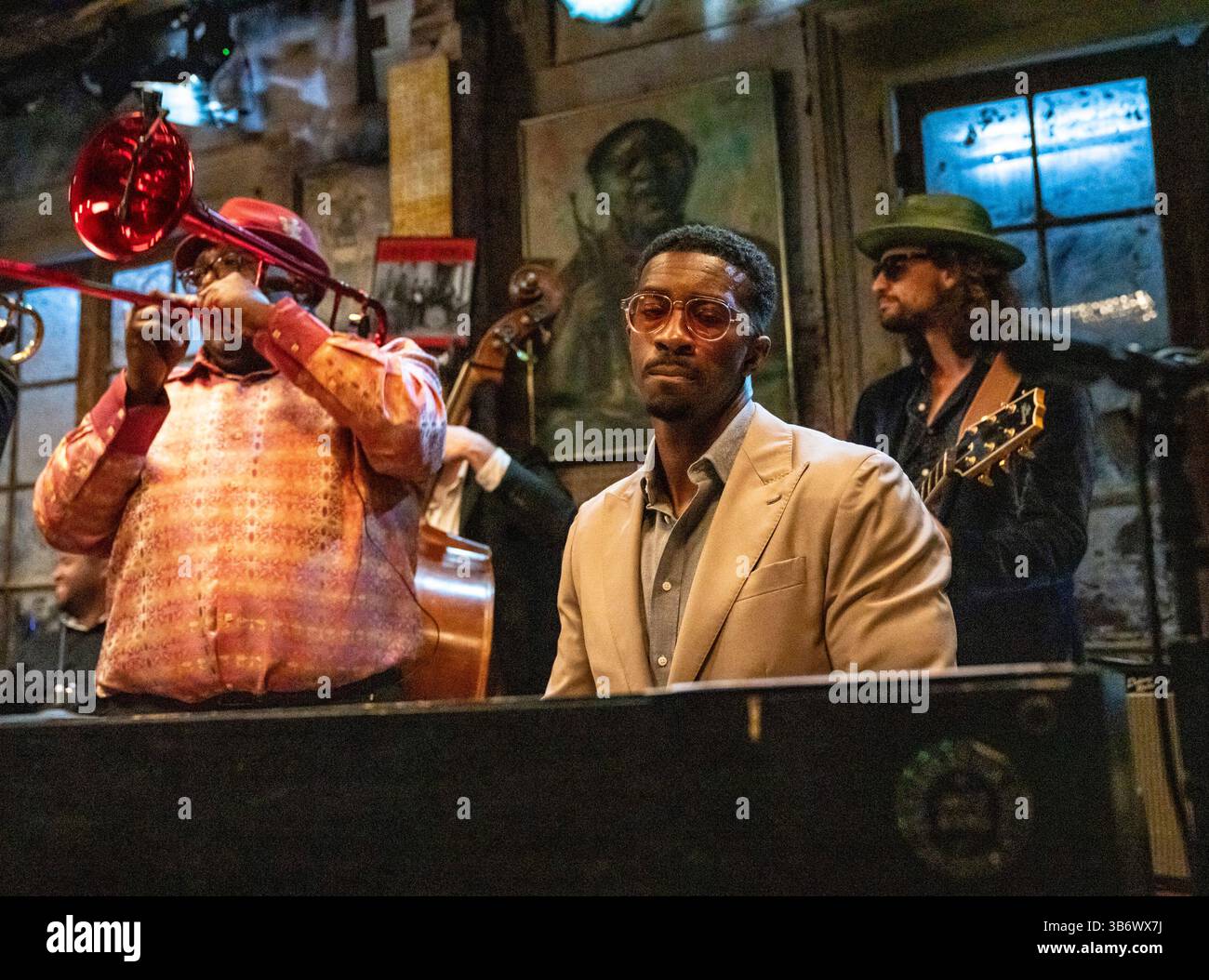 Ronnel Johnson, left, Kyle Roussel and Josh Starkman perform with ...