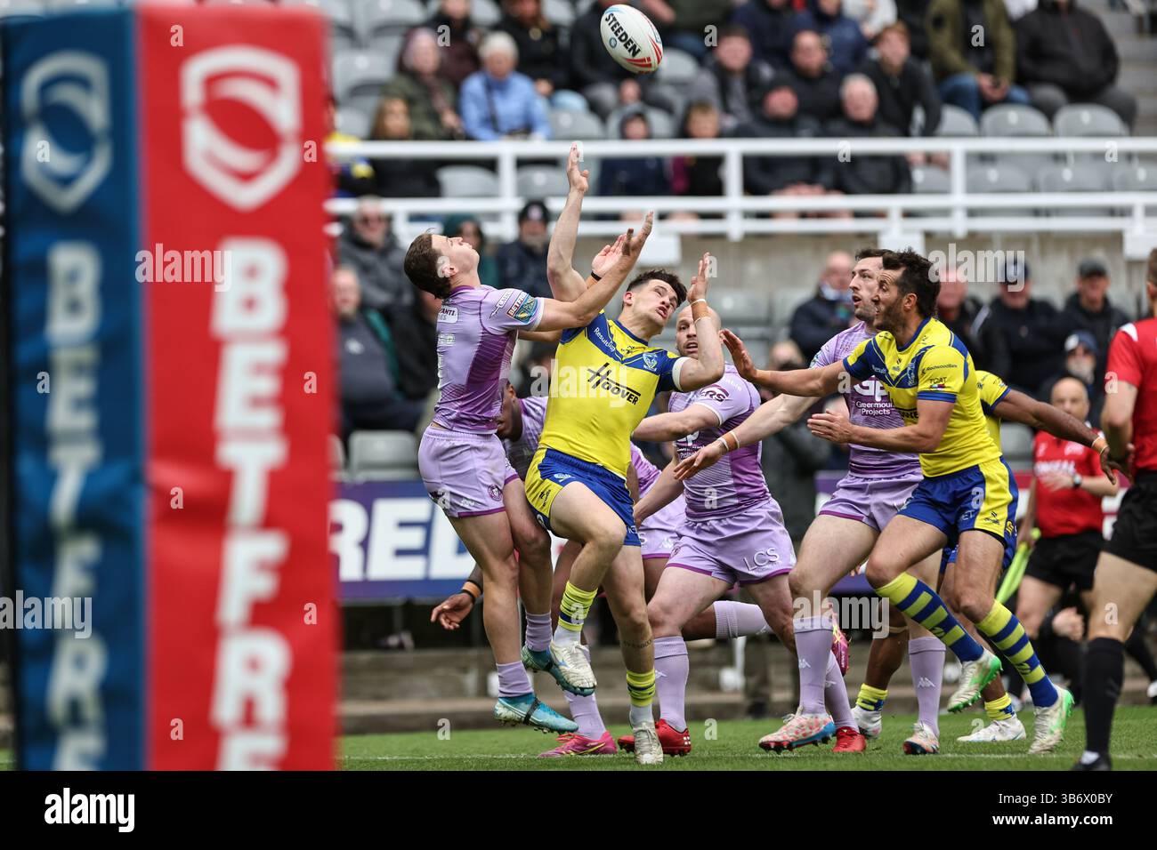 Jai Field of Wigan Warriors and Josh Thewlis of Warrington Wolves ...