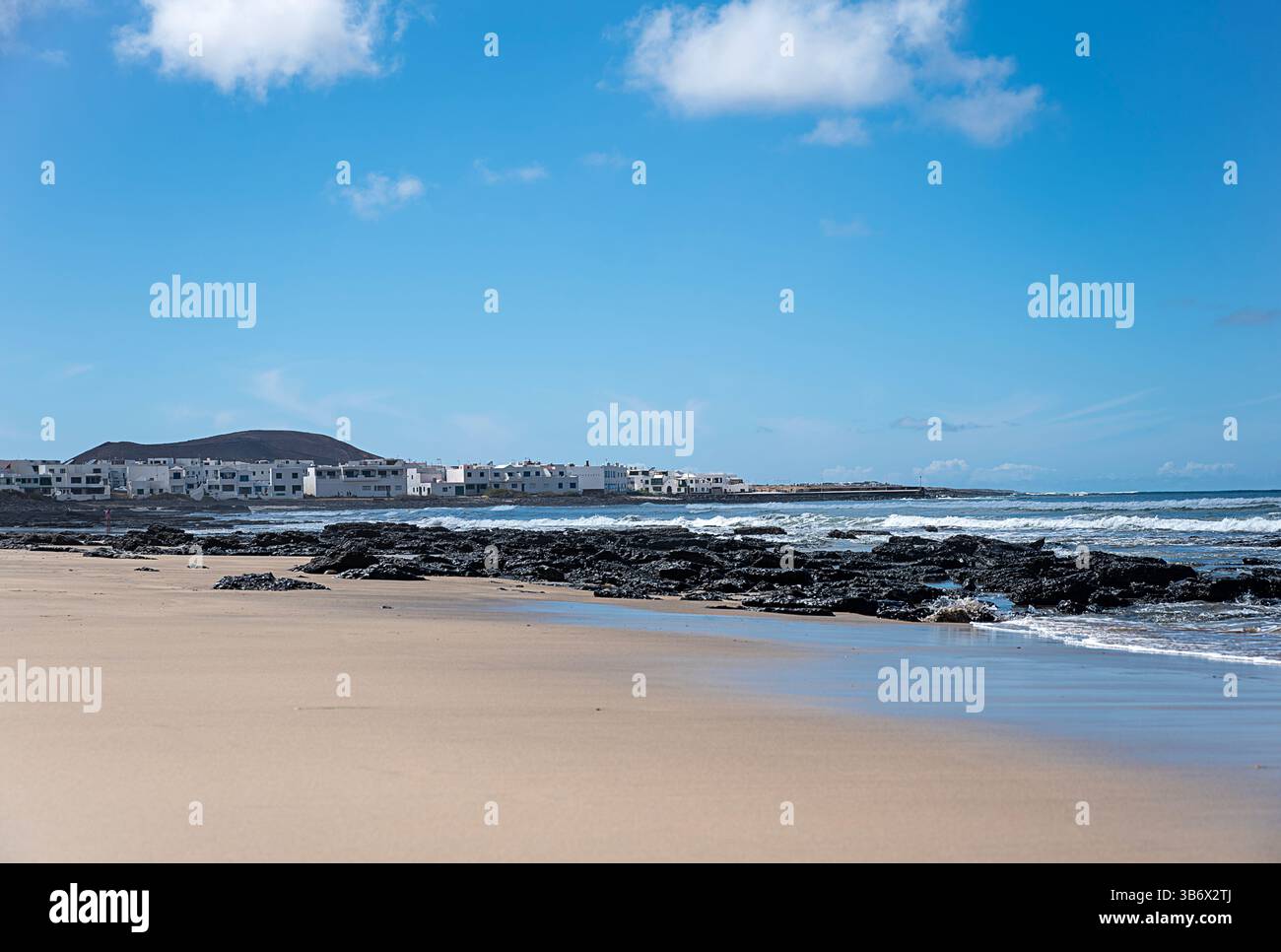 Landscape photography of village Caleta de Famara and Famara beach ...