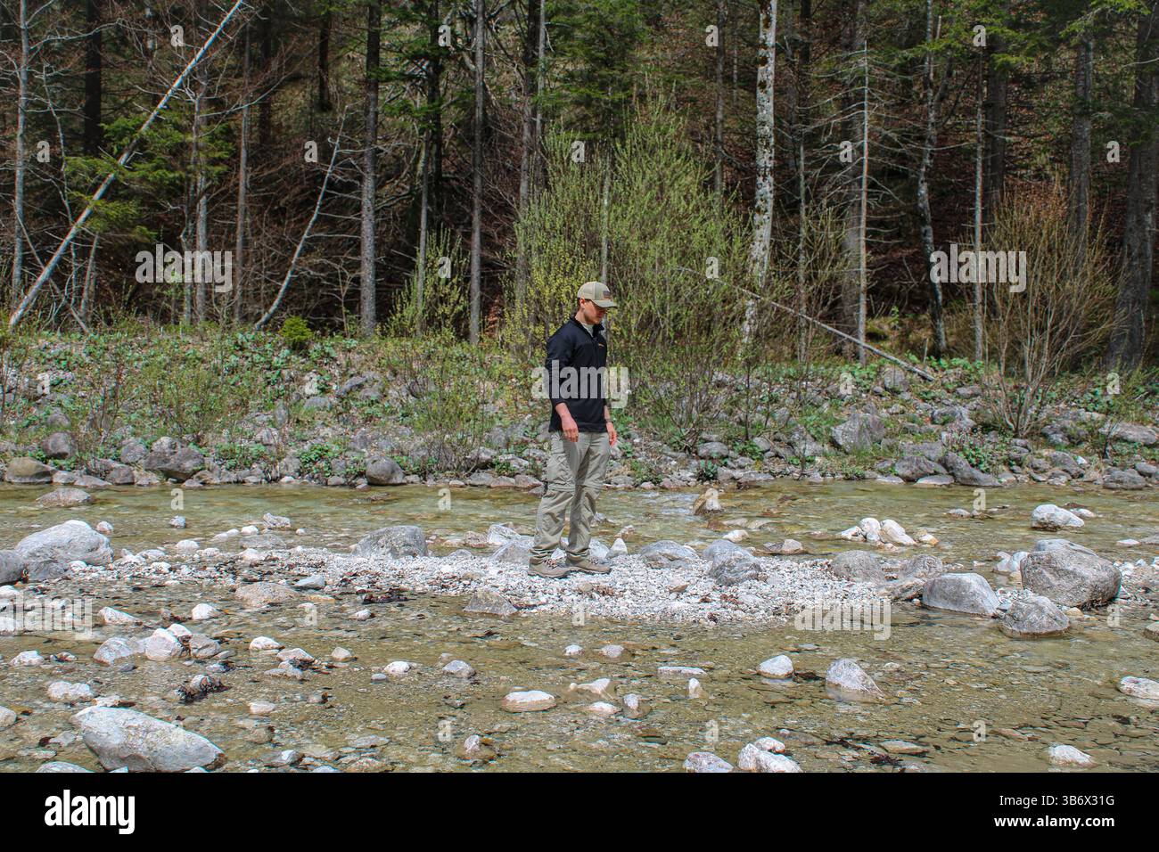 Explorer in the Forest – Hiking Through Bavarian Wilderness by River ...