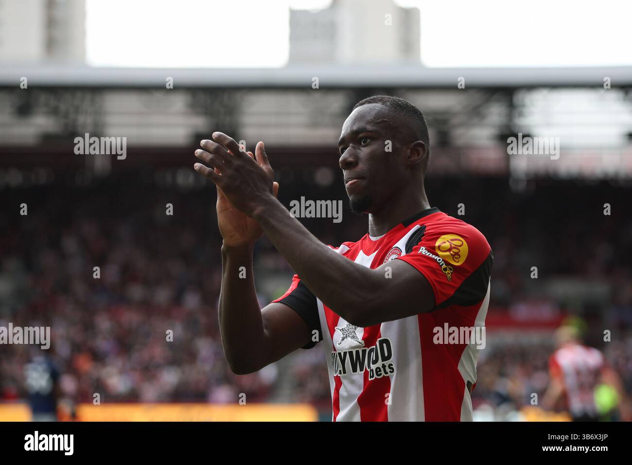 LONDON, UK - 4th May 2025: Michael Kayode of Brentford acknowledges the ...