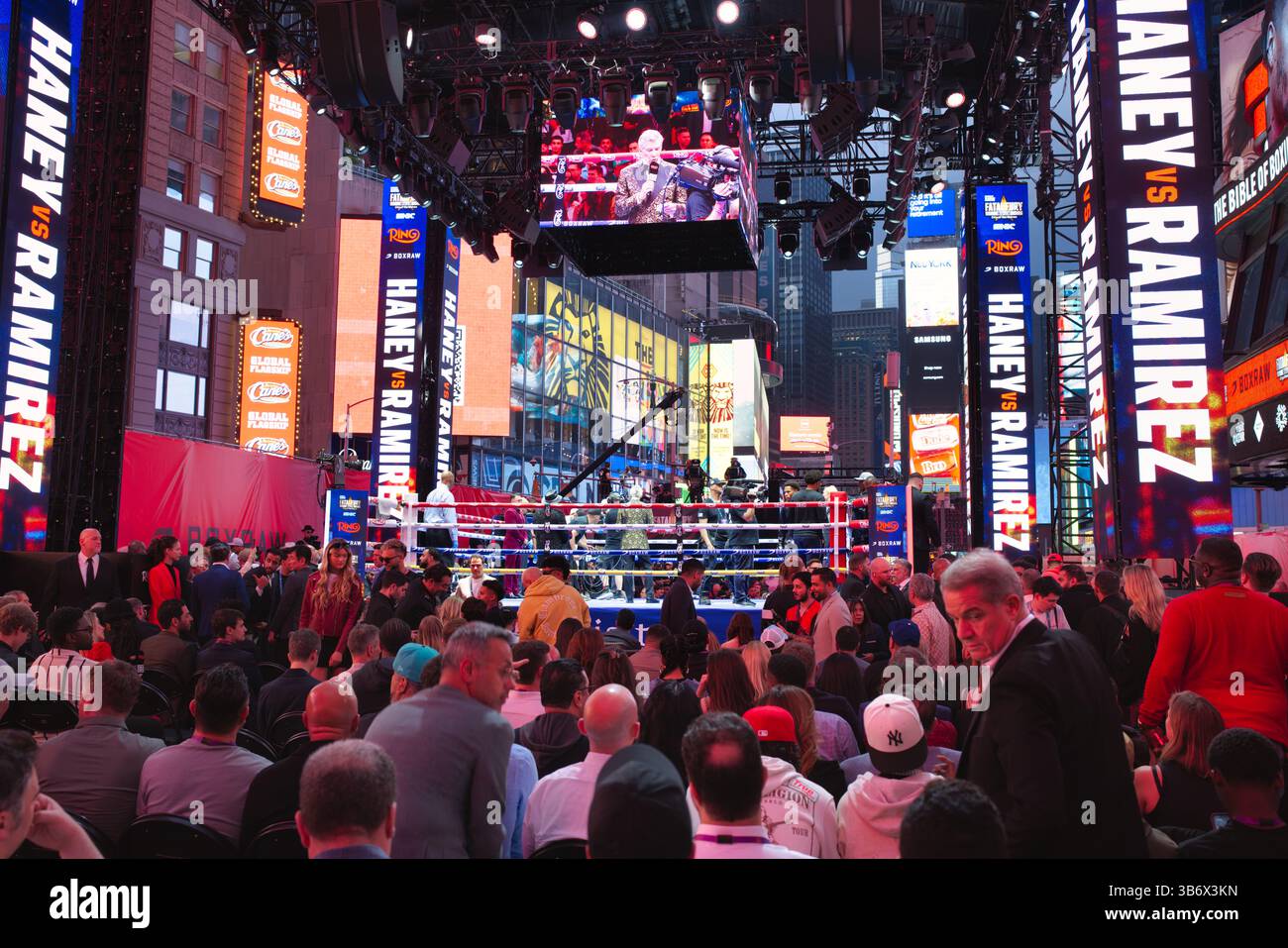 A boxing match setup in Times Square, NYC, features a boxing ring ...