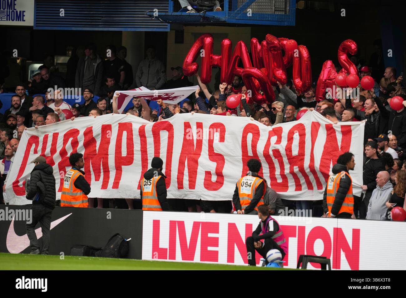 Liverpool fans cheer for their team prior to the English Premier League ...