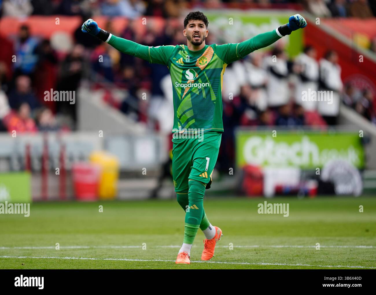 Manchester United goalkeeper Altay Bayindir celebrates after his side ...
