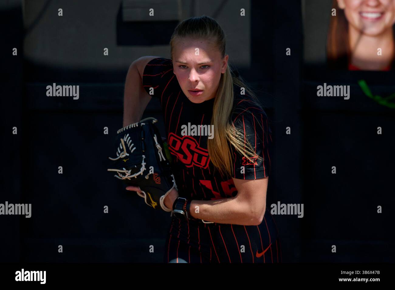 Oklahoma State Cowgirls pitcher Katie Kutz (16) warms up in the bullpen ...