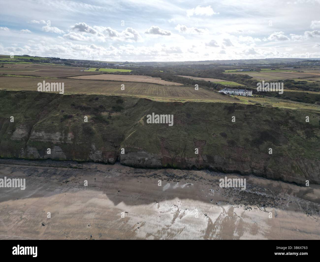 Aerial view of Saltburn Beach, North Yorkshire, showing dramatic cliffs ...