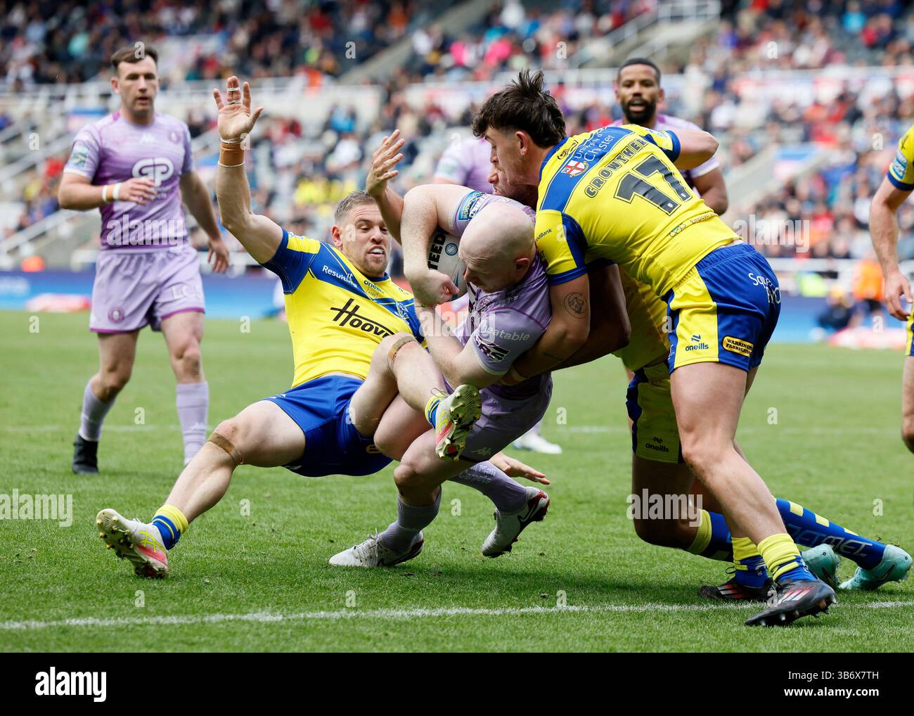Wigan Warriors' Liam Farrell is tackled during the Betfred Super League ...