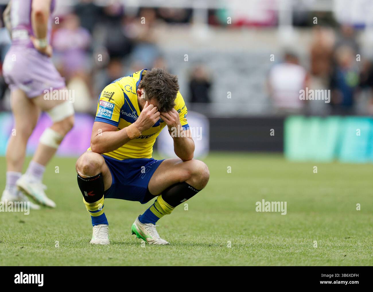 Warrington Wolves' Stefan Ratchford appears dejected after the Betfred ...