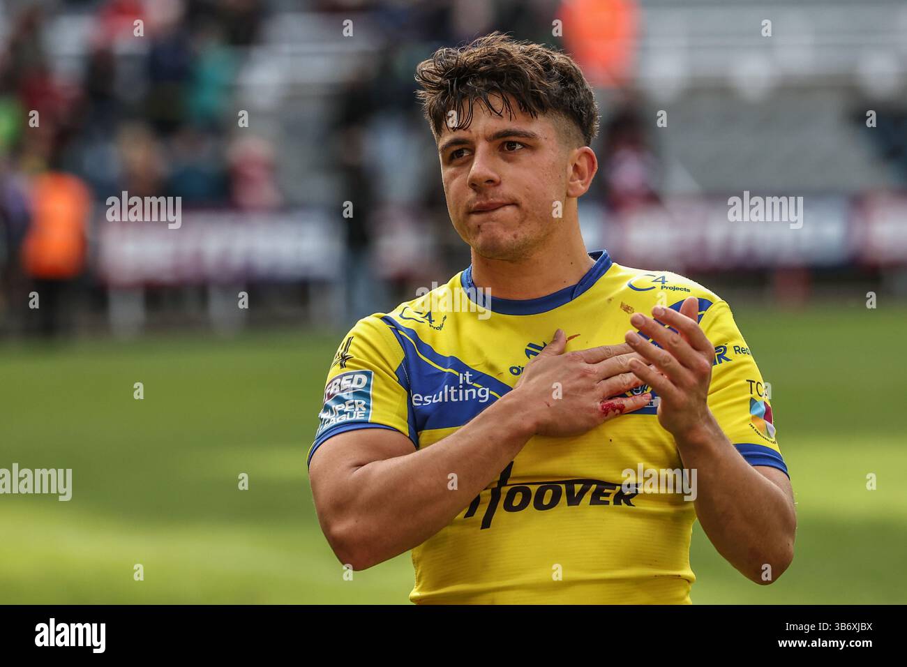 Oli Leyland of Warrington Wolves applauds the fans after the game ...