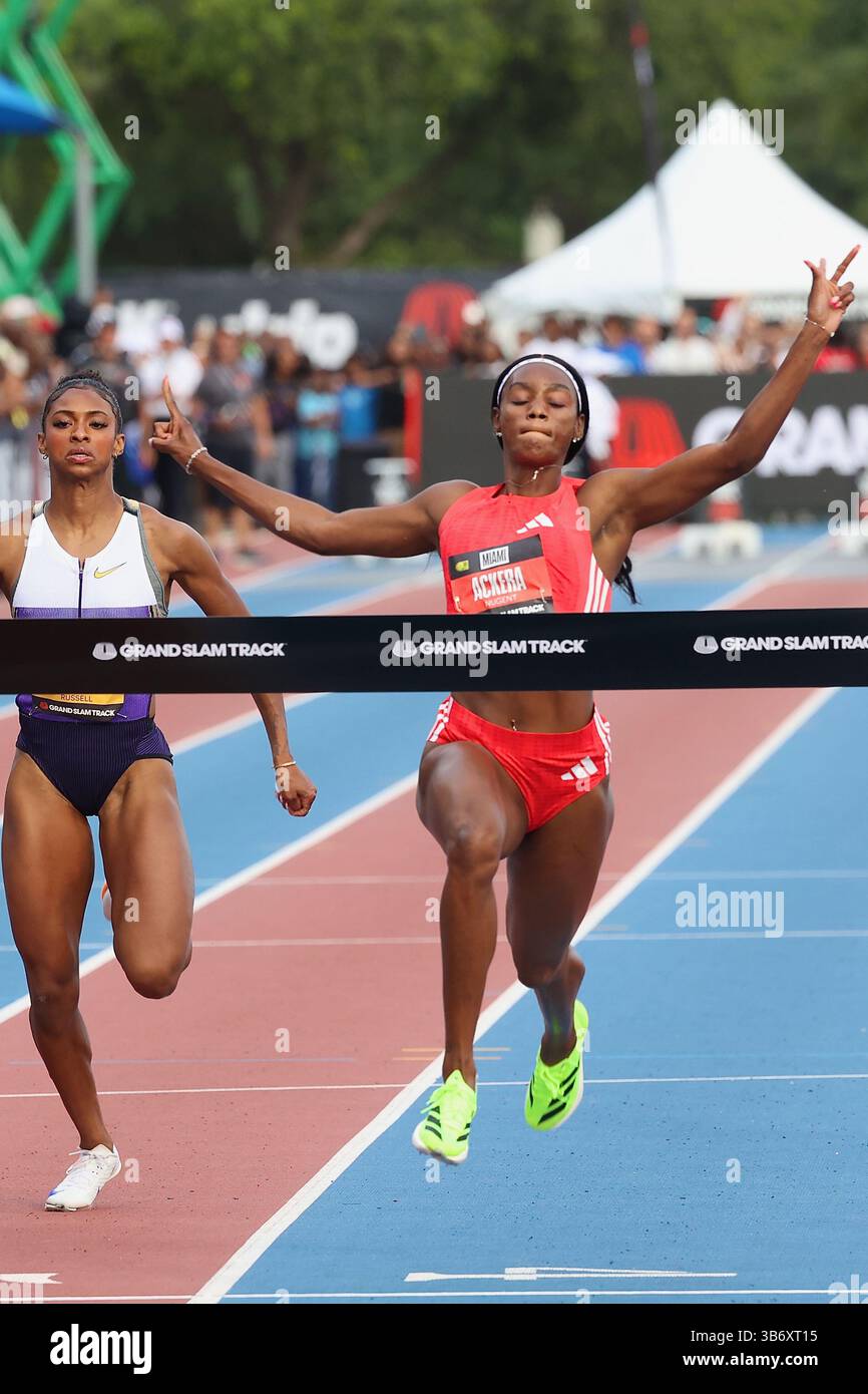 Ackera Nugent wins the 100 meters during the Grand Slam Track Miami at ...